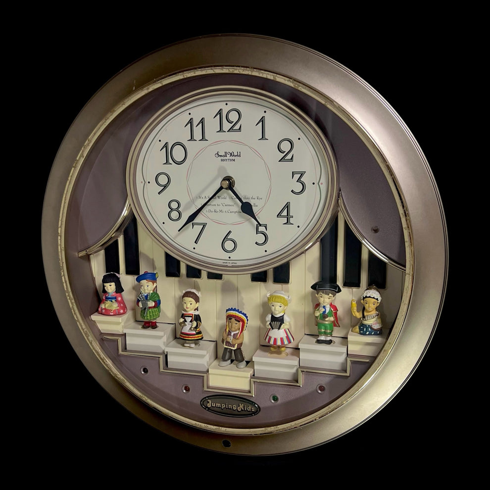 Rhythm “Jumping Kids” Magic Motion Musical Wall Clock with Moving Figu ...