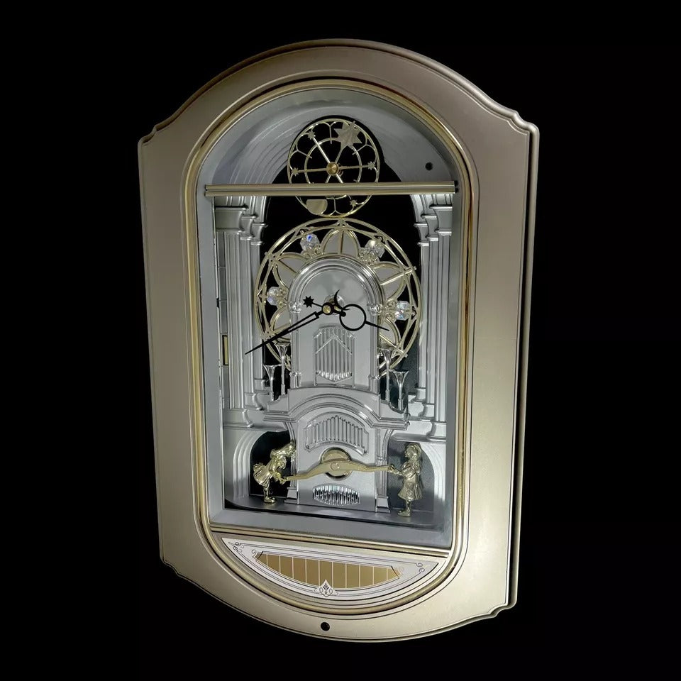 Rhythm “Renaissance” Magic Motion Musical Wall Clock with Moving Dial ...