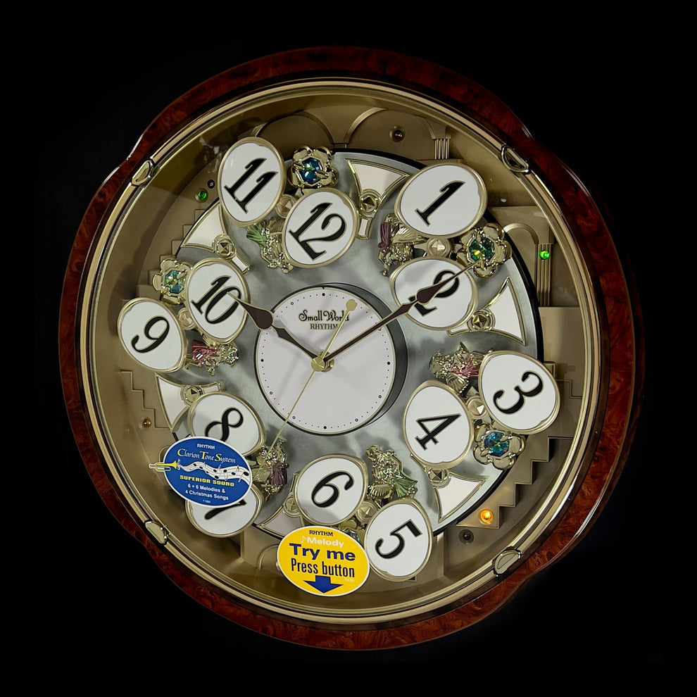 Rhythm “Woodgrain Blossom” Magic Motion Musical Wall Clock with Animat ...