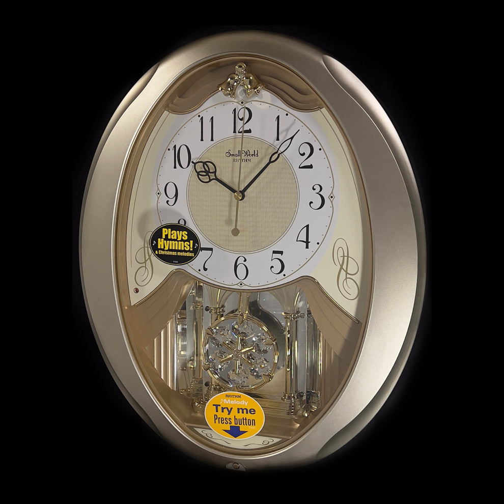 Rhythm “Champagne Snowflake” Musical Motion Decorative Pendulum Wall C ...